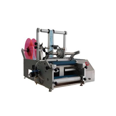 China Sticker Labeling Machine Single Double Side Alcohol Round Glass Bottle Labels Manual Labeler for sale