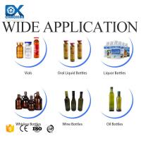 China Automatic Small Vial Olive Oil Wine Glass Bottle Filling Capping Labeling Machine 220V 1800bph for sale