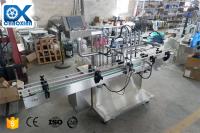 China 4 Head Gravity Bottle Filler 5-5000ml Automatic Liquid Filling Machine for Juice Glycerin for sale