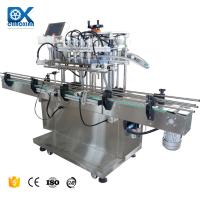 China Automatic 4 Head Piston Filling Machine 100-5000ml for Liquid Oil Tea Bottle Filler for sale
