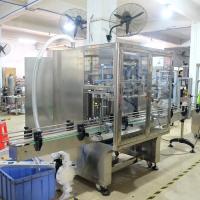 China Stainless Steel 4 Heads Linear Filling Machine for Beverage Juice Milk Oil 100-5000ml for sale