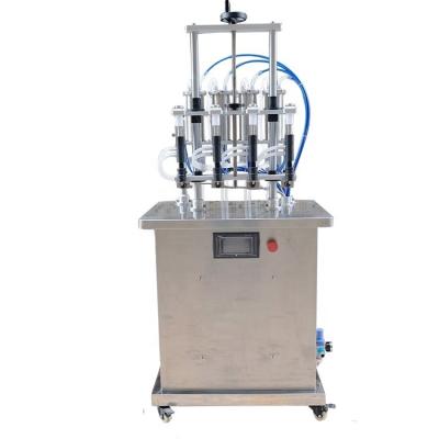 China Semi Automatic Vacuum Equal Level Filling Machine 5-5000ml for White Spirit Whisky Liquid Packaging for sale