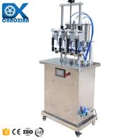 China Semi-Auto Vacuum Level Filling Machine 4 Nozzles 5-5000ml Perfume Essential Oil Alcohol for sale