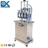 China Semi Automatic Tabletop 4 Nozzle Vacuum Liquid Filling Machine 150W 1000-2400BPH for sale