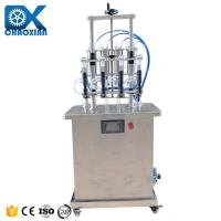 China Semi Automatic Vacuum Perfume Filling Machine 4 Nozzles 1000-2400BPH Stainless Steel for sale