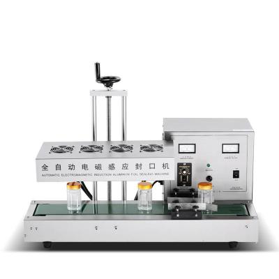 China Automatic Induction Sealing Machine for Glass Bottles 15-120mm Diameter with 1200-4800 BPH Speed for sale