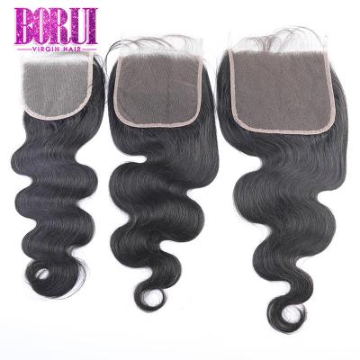 China Body Wave Raw Virgin Human Hair Transparent Lace Closure Natural Color Free Part for sale