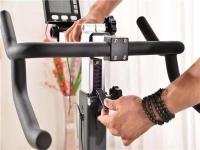 China Newest Type 1200*610*1000 Air Resistance Stationary Exercise Upright Spinning Airbike for sale