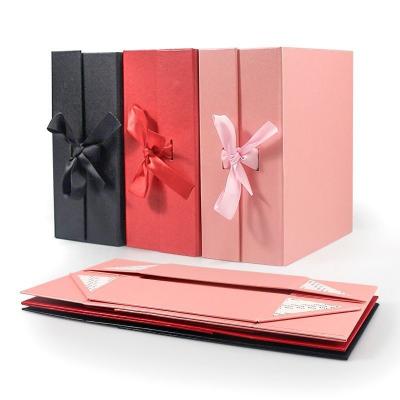 China Recycled Paper Ribbon Tie Magnetic Gift Boxes With Matte Finish Packaging Boxes for sale