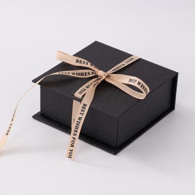 China Book Type Paper Carton Packaging Boxes Luxury Cardboard Gift Box With Ribbon Closure for sale