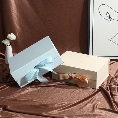 China Make up Cosmetics Shirts Shoes Packaging Foldable Custom Logo Storage Box with Ribbon and Logo Printing for sale
