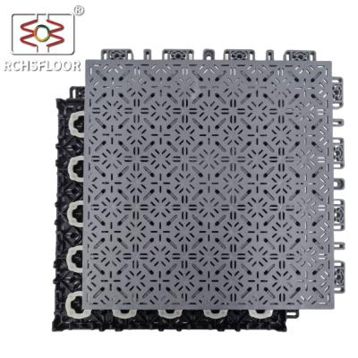 China 34x34cm 600g Interlocking Sports Floor Tiles with 1.8cm Thickness and 32% Shock Absorption for sale
