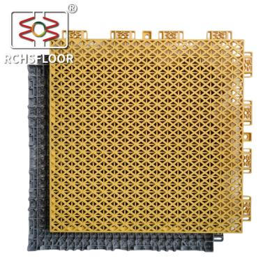 China Yellow PP Interlocking Sports Tiles 34×34×1.81cm for Basketball Courts and Multi-Sport Applications for sale