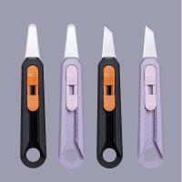 China Ceramic Utility Knife with Sawtooth Edge Handle 32mm Blade Retractable Safety Cutter for sale