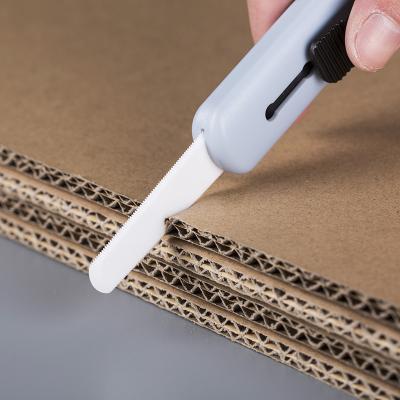China Ceramic Cardboard Box Cutter Utility Safety Knife 177mm Handle Serrated Blade for sale