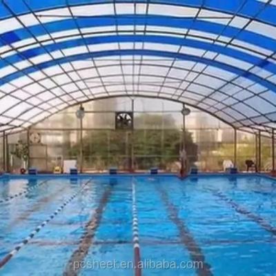 China Plant Greenhouse for Office Building Polycarbonate Home Indoor Foldable Kit Aluminium Frame Garden Backyard Greenhouse for sale
