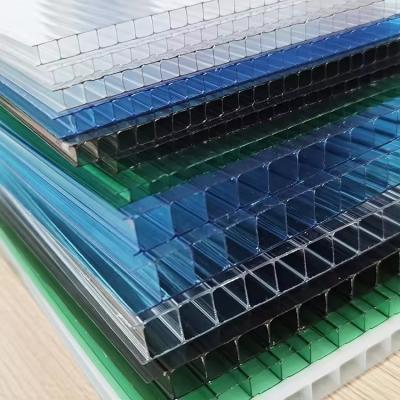 China 8mm 10mm Four Layers Twin Wall Plastic Transparent Hollow Sun Sheet Circular Edge Polycarbonate Panels for Window Greenhouse for sale