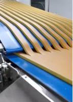 China Stainless Steel Inclined Declined Food Conveyor System for Bakery Production Lines - 304 Grade Construction for sale