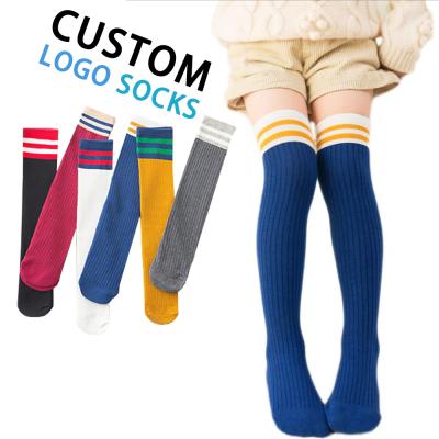 China URON QUICK DRY Custom Fashion School Kids Knocks Knee High Stripe Knocks Out Kids Football Soccer Sports Socks for sale