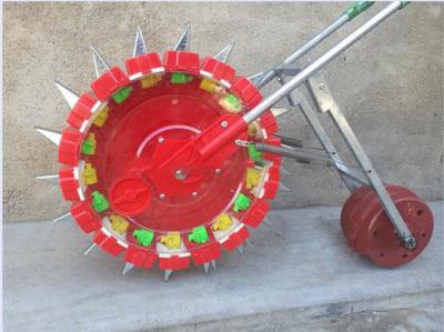 China Hand Push Farming Tools Equipment SGS Corn Seed Planter For Plain for sale