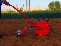 China 3 Rows Farming Tools Equipment 3 Wheels Vegetable Seed Sowing Machine for sale