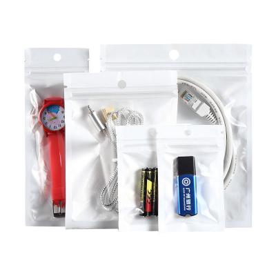 China Customized printed pearlescent transparent plastic packaging bags, white zippers, electronic accessories, glasses, necklaces, gemstones for sale