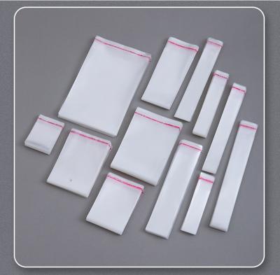 China Transparent adhesive clothing bags with flat mouth self-sealing pressure-sensitive strips, used for packaging socks and shoes for sale