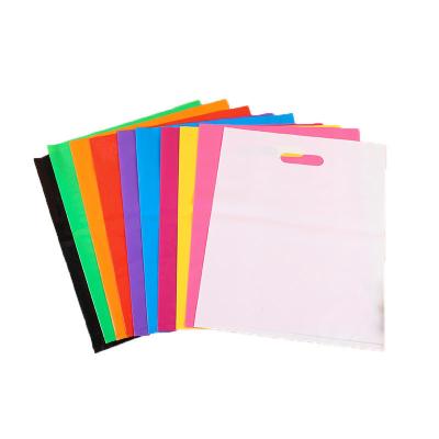 China In September, plastic handbags for clothing, plain-colored gift shopping bags without labels, are recyclable for sale