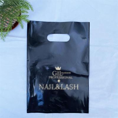 China Customized black polyethylene plastic T-shirt bag with four-finger flat pockets, suitable for supermarket, clothing and shoe store logo printing options for sale
