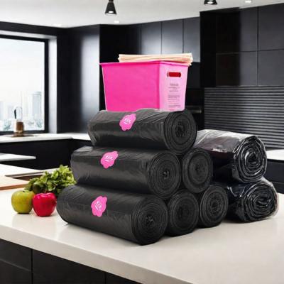 China Biodegradable black flat-bottomed corner support garbage bags, used for packaging toilet paper and Tampon plastic waste rolls for sale