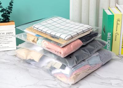 China Transparent frosted zipper bag PE clothing plastic bag for sale