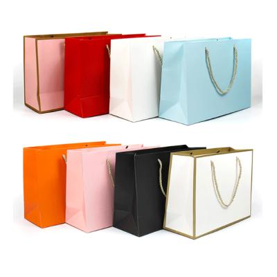China High-end Custom logo Clothing Shoes Underwear Packaging Luxury Paper Bag Clothing Boutique Shopping Paper Bag for sale