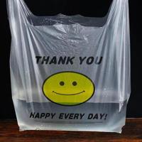 China Wholesale Direct T-Shirt Vest Carrier Bag Clear PE LDPE Shopping Bag Customized Smiling Face Plastic Bag for sale
