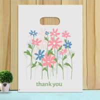 China Factory stock four-finger flat pocket small size plastic bag clothing store bag gift bag packaging bag clothes handbag plastic gift bag Printed HDPE Hand Hole Plastic Bags, Custom Logo Shopping Carry for sale