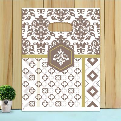 China Eco Friendly Printed HDPE Hand Hole Bags Reusable Custom Logo Carry Bags for Retail for sale