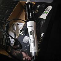 China Dual Voltage Ionic Multifunctional Hair Dryer Brush Ceramic Tourmaline for sale