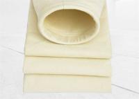 China Singeing Sewn Round Bottom Aramid Nomex Filter Bag 500-550 Gram for sale