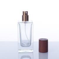China Customized 50ml Perfume Spray Bottle With Wooden Cap Square Shape for sale