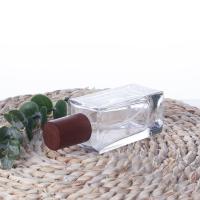 China Customized 50ml Perfume Spray Bottle With Wooden Cap Square Shape for sale