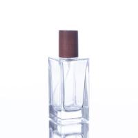 China Customized 50ml Perfume Spray Bottle With Wooden Cap Square Shape for sale