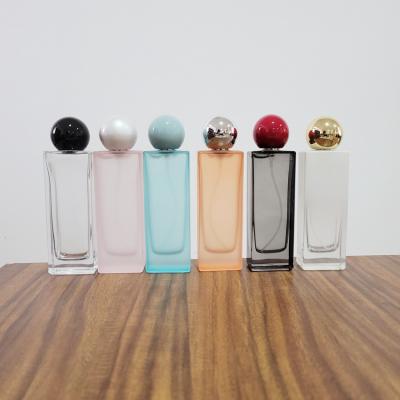 China 50ml 100ml Perfume Spray Bottle Wood Cap Muti Colors for sale