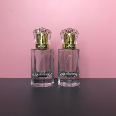 China Cosmetic 50ml Perfume Spray Bottle Delicate Crown Cap Recyclable Filling for sale