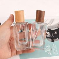 China Walnut Scented Water Perfume Spray Bottle Portable 30ml 50ML Glass for sale
