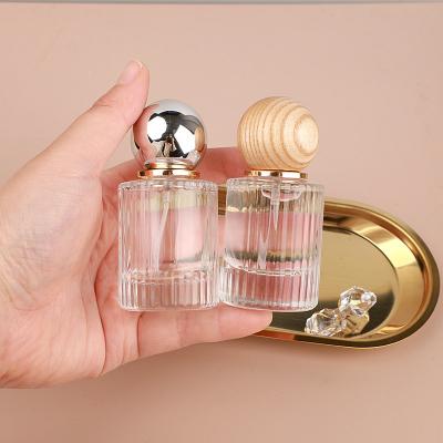 China Portable Perfume Spray Bottled 30ml 50ML Glass Empty Walnut for sale