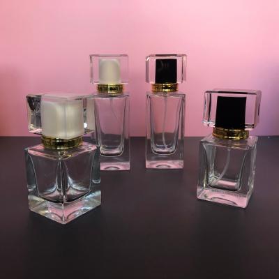 China 30ML Perfume Subpackage Bottle 50ML Spray Acrylic Cap Square Glass for sale