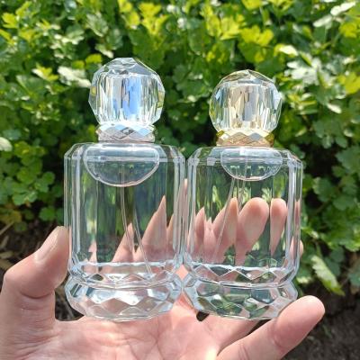 China Crystal White Glass Perfume Bottle 100ml Vertical Stripe Cylindrical Bayonet for sale