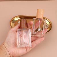 China Portable Perfume Sub Bottled 30ml Square Glass Spray for sale