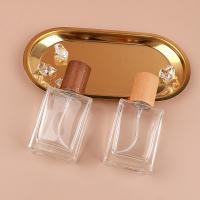 China Portable Perfume Sub Bottled 30ml Square Glass Spray for sale