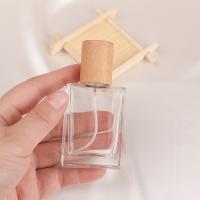 China Portable Perfume Sub Bottled 30ml Square Glass Spray for sale