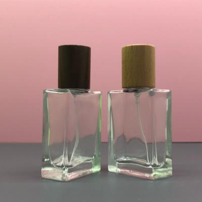 China 30ML Premium Perfume Bottle Wood Cap Portable Glass Empty 500pcs for sale